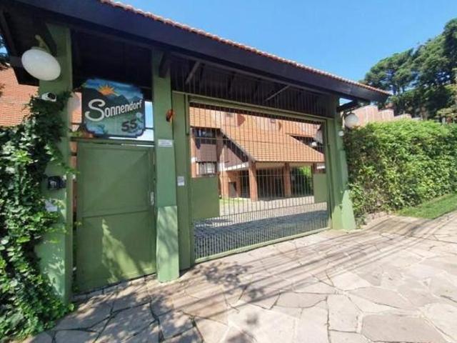 CASA EM CONDOMÍNIO PERTO DA RUA COBERTA GRAMADO