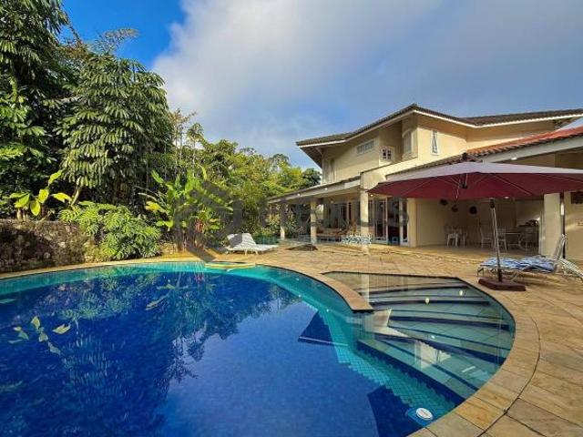 Casa em condomínio reformado com varanda e lazer no Granville na Enseada, Guaruj
