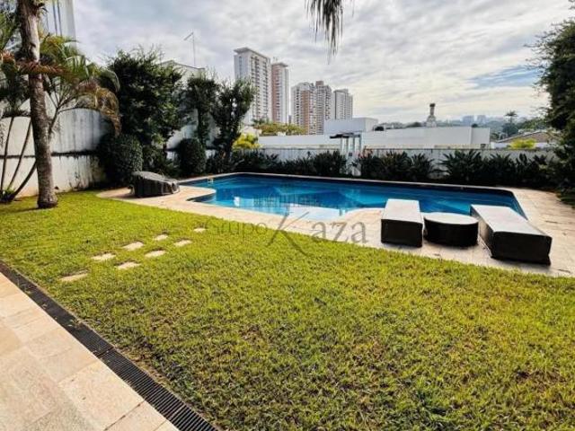 Casa em Condomínio Tamboré 1 4 Dormitórios 640m²