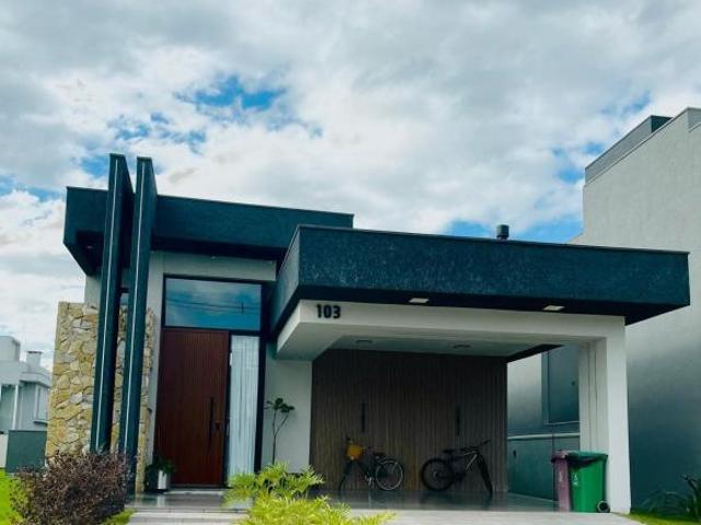 CASA EM CONDOMINIO TÉRREA, 3 SUÍTES 4 VAGAS DE GARAGEM, EM GRAVATAI RS