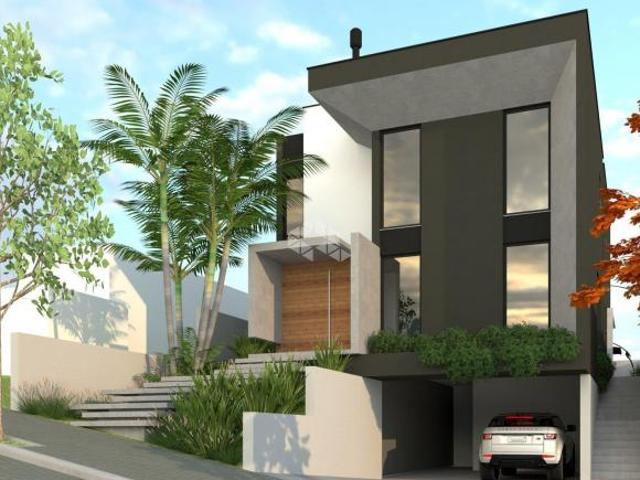 Casa em Construção à Venda no Condomínio Real Park com 4 suítes e 2 vagas de garagem em Santa Maria