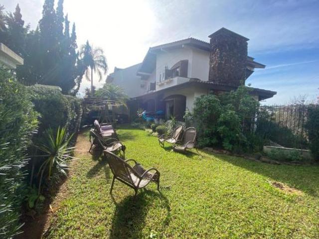 Casa em Porto Alegre, Três Figueiras, com 3 quartos, 322m²
