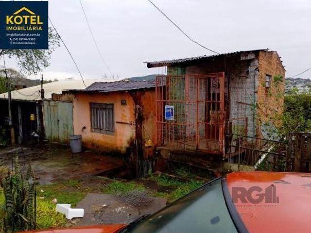 Casa em Porto Alegre, no bairro Cavalhada, com 3 dormitório s, à venda