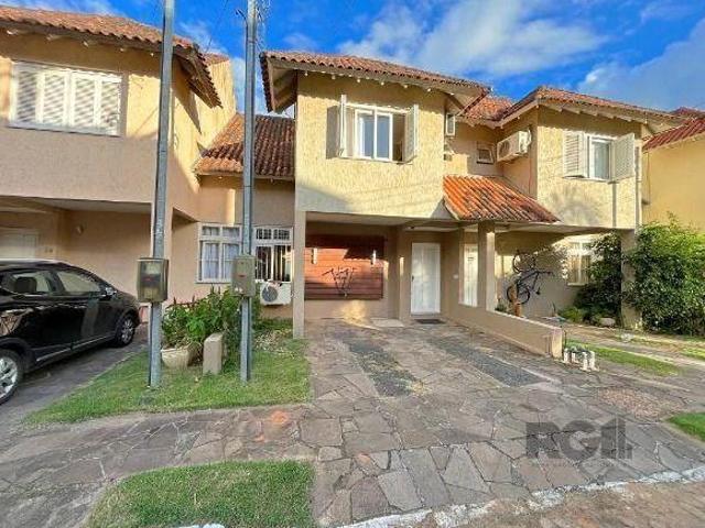 Casa em Porto Alegre, no bairro Campo Novo, com 3 dormitório s, e 3 banheiros