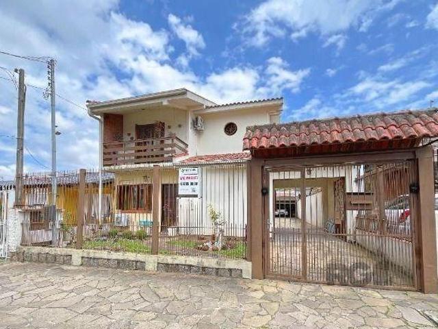 Casa em Porto Alegre, no bairro Aberta dos Morros, com 3 dormitório s, à venda