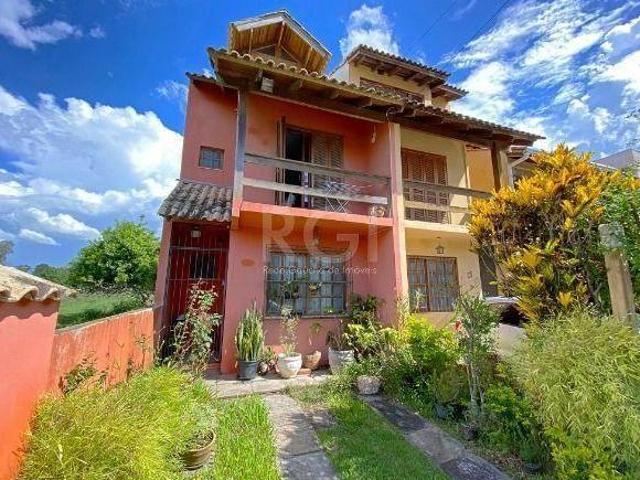 Casa em Porto Alegre, no bairro Hípica, com 2 dormitório s, e 2 banheiros, à venda