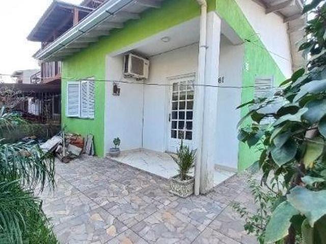 Casa em Porto Alegre, no bairro Hípica, com 2 dormitório s, e 2 banheiros, à venda