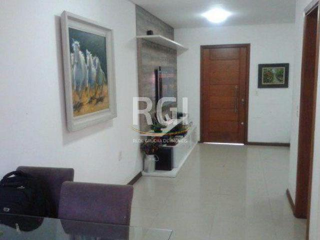 Casa em Porto Alegre, no bairro Hípica, com 3 dormitório s, à venda
