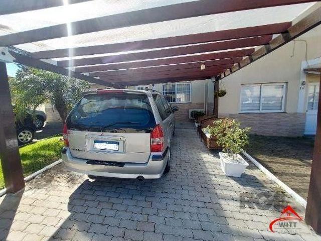 Casa em Porto Alegre, no bairro Hípica, com 3 dormitório s, e 3 banheiros, à ve