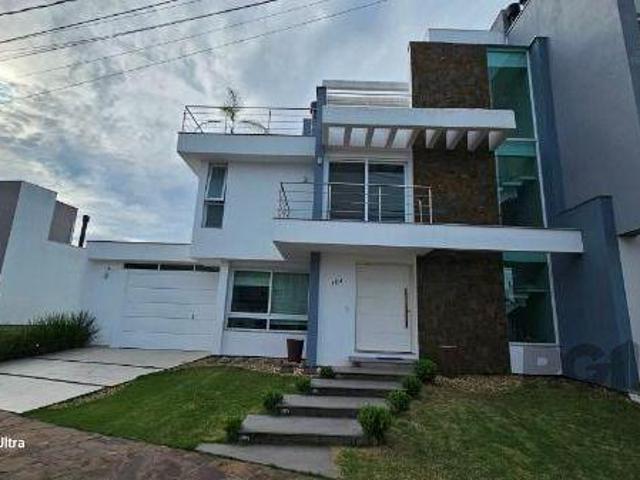 Casa em Porto Alegre, no bairro Hípica, com 3 dormitório s, e 3 banheiros, à venda