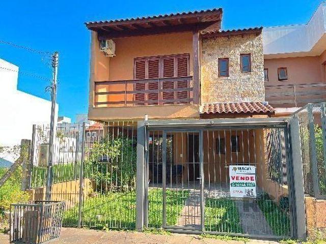 Casa em Porto Alegre, no bairro Hípica, com 3 dormitório s, e 3 banheiros, à venda