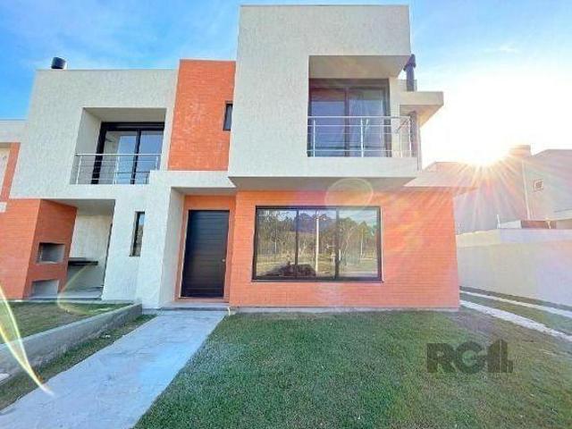 Casa em Porto Alegre, no bairro Hípica, com 3 dormitório s, e 3 banheiros, à venda