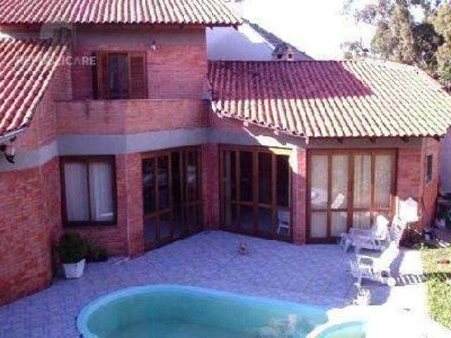 Casa em Porto Alegre, no bairro Jardim Isabel, com 4 dormitório s, à venda
