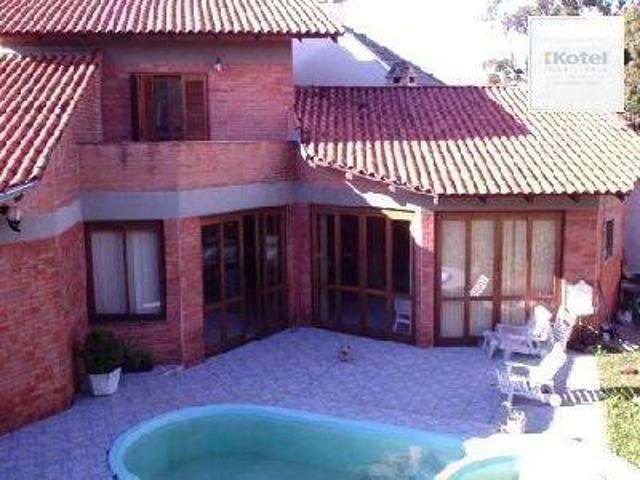 Casa em Porto Alegre, no bairro Jardim Isabel, com 4 dormitório s, à venda