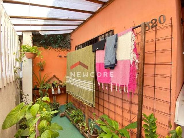 Casa em Rua Vinte e Três de Outubro Mirim Praia Grande/SP