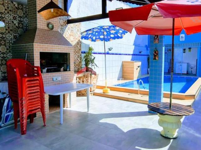 Casa em Rua Vinte e Três de Maio Mirim Praia Grande/SP