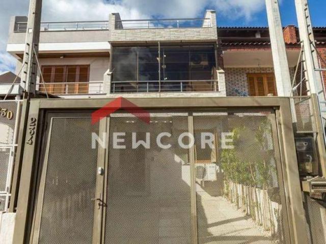 Casa em Rua Waldemar da Silva Tavares Guarujá Porto Alegre/RS