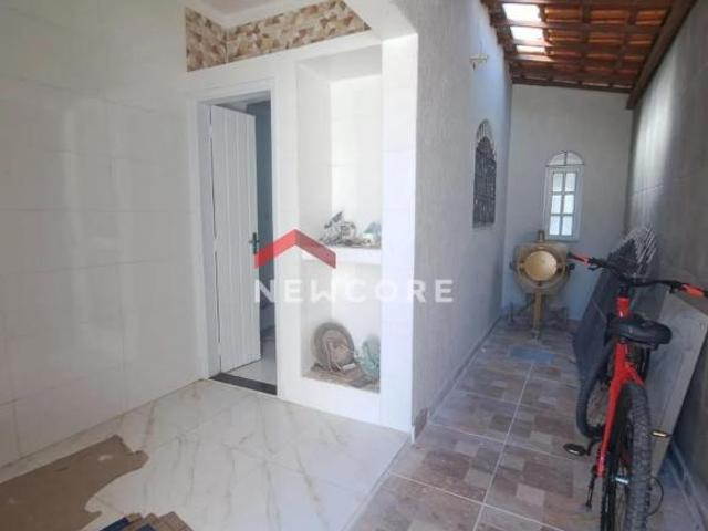 Casa em Rua Afonso Schmidt Solemar Praia Grande/SP