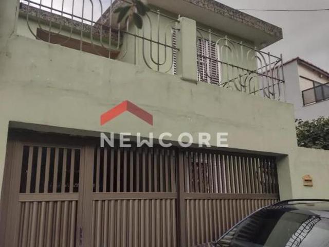Casa em Rua Arnaldo Silveira Macuco Santos/SP