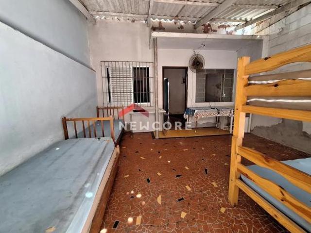 Casa em Rua Comandante Rodolfo Coelho da Silva Caiçara Praia Grande/SP