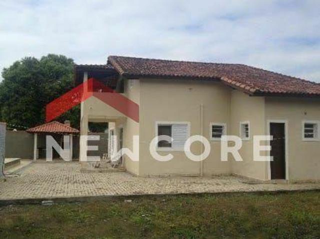 Casa em Rua da Glória Balneario Maria Helena Novaes Peruíbe/SP