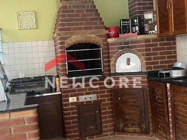 Casa em Rua Doutor Fernando Costa Vila Valença São Vicente/SP