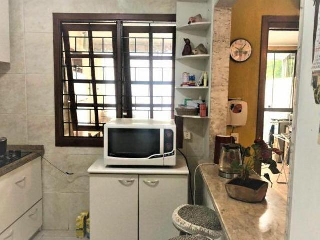 Casa em Rua Fábio Coelho de Magalhães Guarujá Porto Alegre/RS