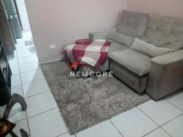 Casa em Rua Maria Domingas Santos Reis Princesa Praia Grande/SP