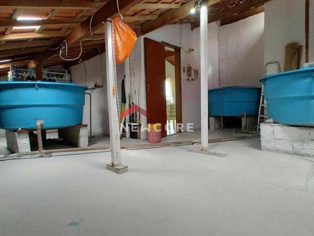 Casa em Rua Poxoréu Cidade Nova Peruíbe Peruíbe/SP
