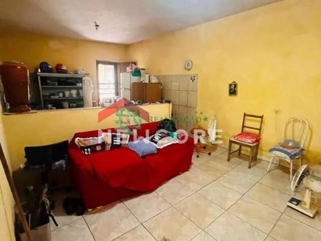 Casa em Rua Santa Tereza Jussara Mongaguá/SP