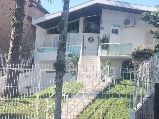 Casa em Rubem Berta, Porto Alegre/RS de 176m² 4 quartos à venda por R$ 742.000,00
