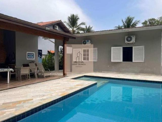 Casa em Riviera de São Lourenço, litoral norte de São Paulo, 4 dormitórios