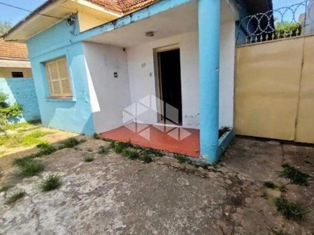 Casa em terreno 10x44 com 2 dormitórios e 2 vagas cobertas em Niterói Canoas