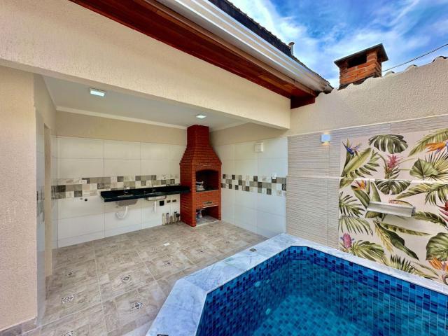 Casa em Vila Caiçara, Praia Grande/SP de 94m² 2 quartos à venda por R$ 679.900,00