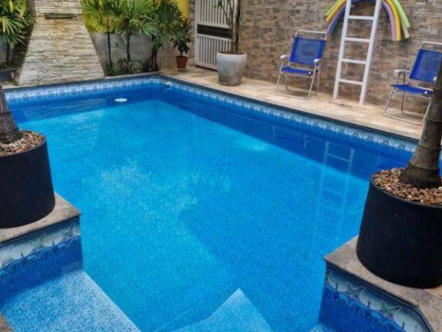 Casa em Vila Caiçara, Praia Grande/SP de 109m² 2 quartos à venda por R$ 1.489.000,00