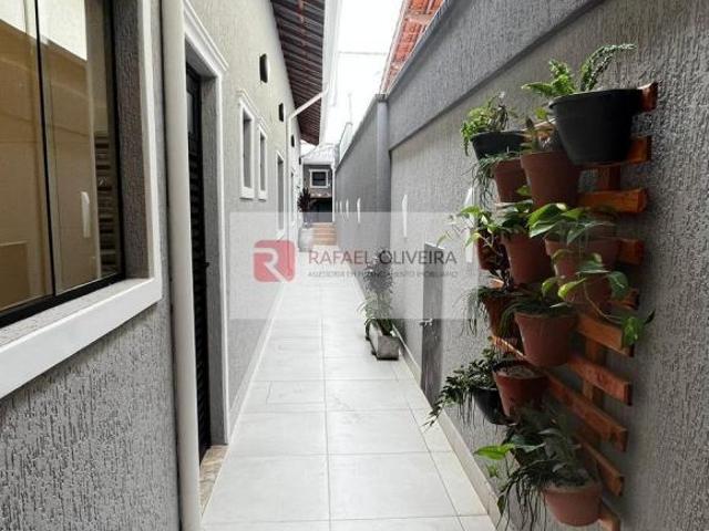 Casa em Vila Caiçara, Praia Grande/SP de 115m² 3 quartos à venda por R$ 998.000,00