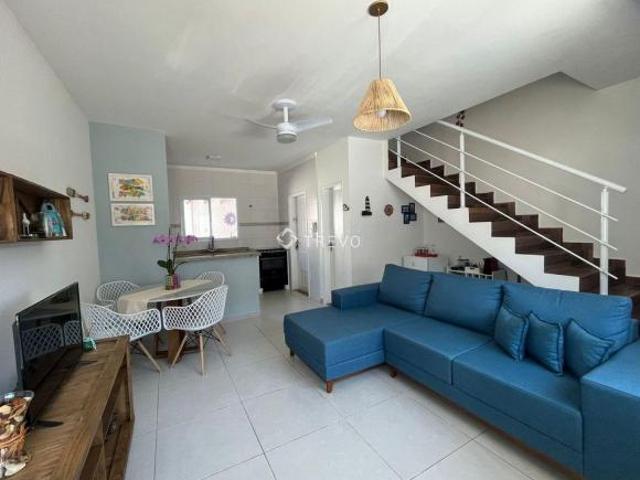 CASA EM VILLAGIO A 800 METROS DA PRAIA COM 2 SUÍTES, 2 VAGAS EM BERTIOGA/SP