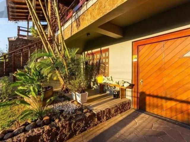 Casa espaçosa com 6 dormitórios e vista incrível no Cristo Redentor