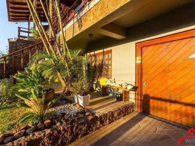 Casa espaçosa com 6 dormitórios e vista incrível no Cristo Redentor