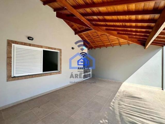 Casa espaçosa com excelente acabamento e 03 suítes à venda no bairro Cidade Jardim em Caraguatatuba