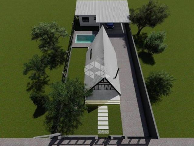 Casa estilo cabana com piscina em Estância Velha