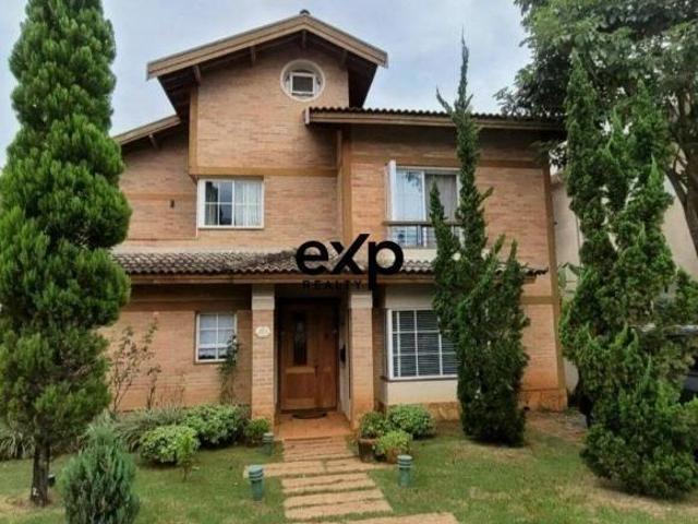 Casa estilo europeu no Alphaville Dom Pedro | 4 suítes, suíte térrea, lazer completo e vista para re