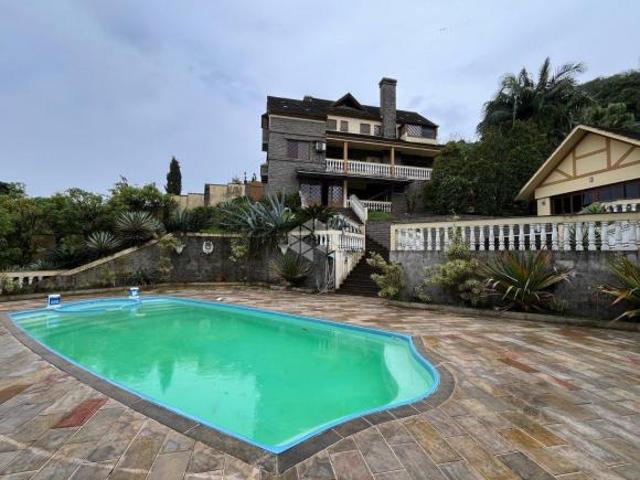 Casa estilo Imperial no Higienópolis com 04 dormitórios