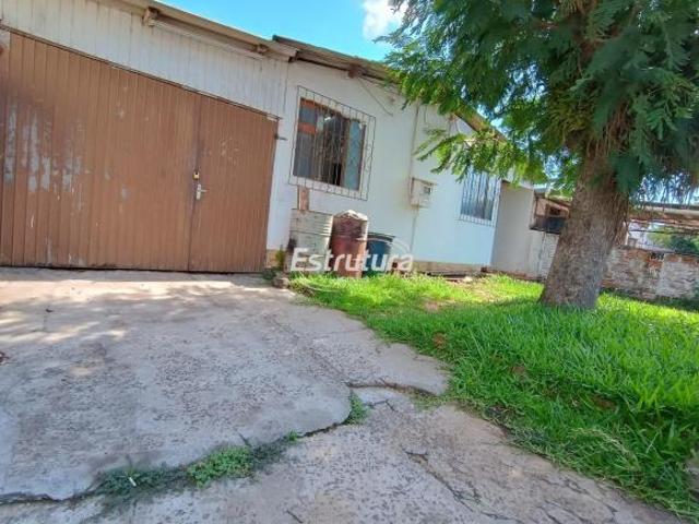 Casa financiável para venda com três dormitórios na Tancredo Neves