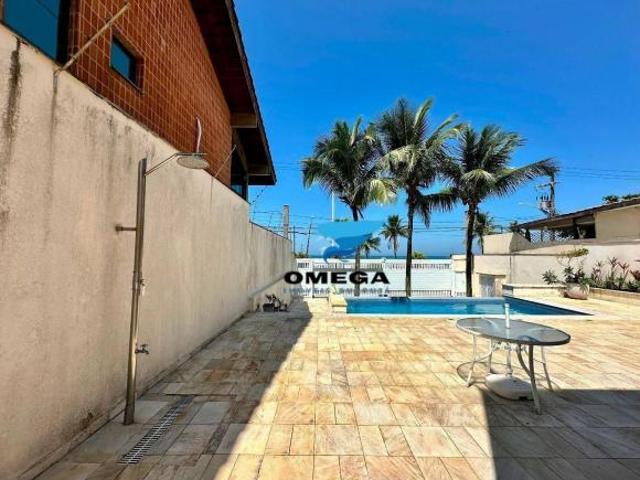Casa frente mar à venda na Praia da Enseada no Guarujá | Omega Imóveis