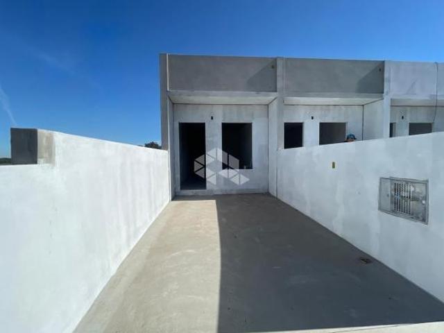 Casa geminada no bairro Distrito Industrial com 1 dormitório