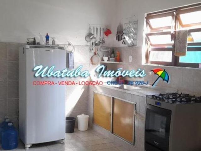 Casa geminada no Perequê açu 02 dormitórios