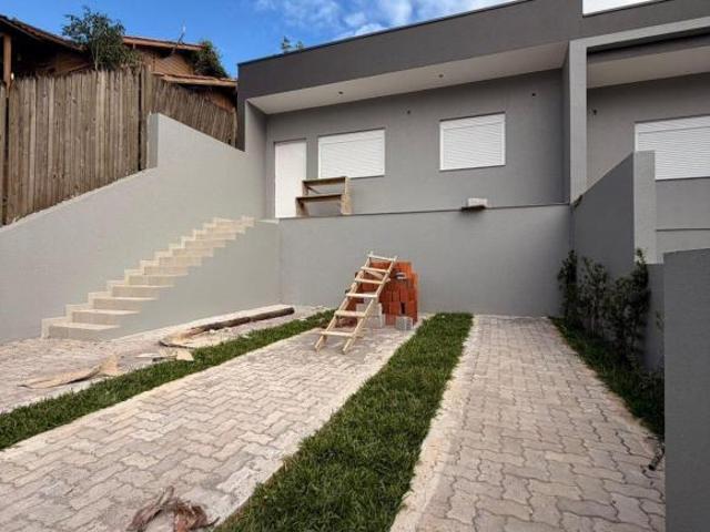 Casa Geminada à venda no bairro Ana Rech