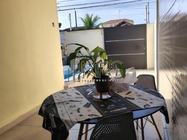 Casa Geminada à Venda no Real, Praia Grande 2 Quartos e 2 Vagas