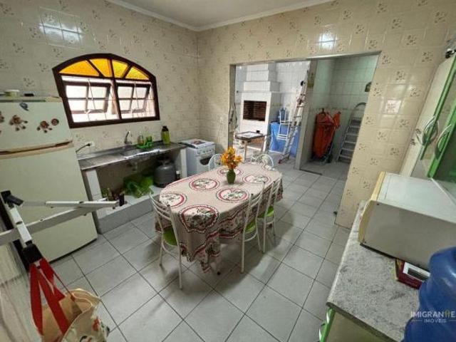 Casa geminada à venda na Mirim, em Praia Grande SP